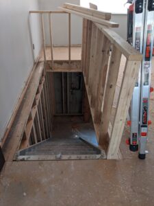 Moving the Stairs Maximized Our Space | Beams to Basements Contractors