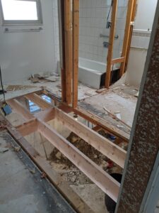 Moving the Stairs Maximized Our Space | Beams to Basements Contractors